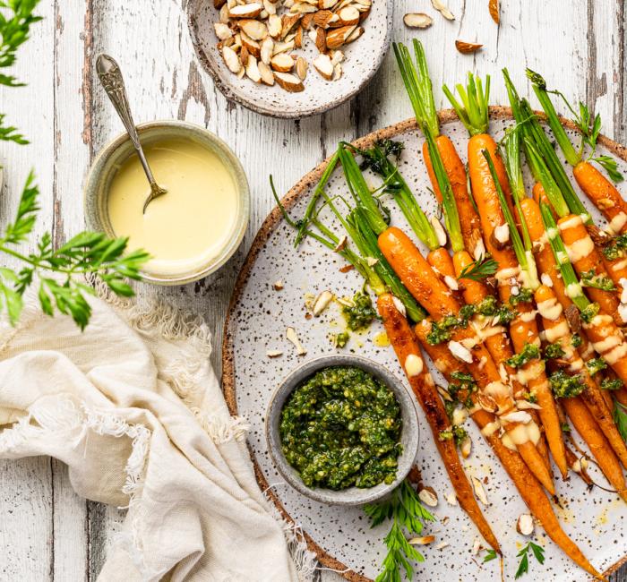 Glazed carrots with carrot top pesto and tahini dressing | Veggies First
